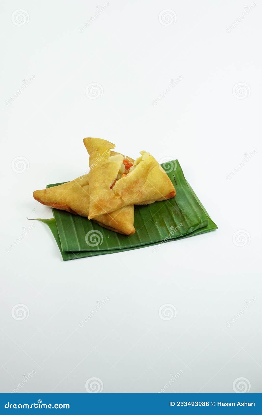 Triangular Spring Roll Snacks with Banana Leaf Base on White Background ...