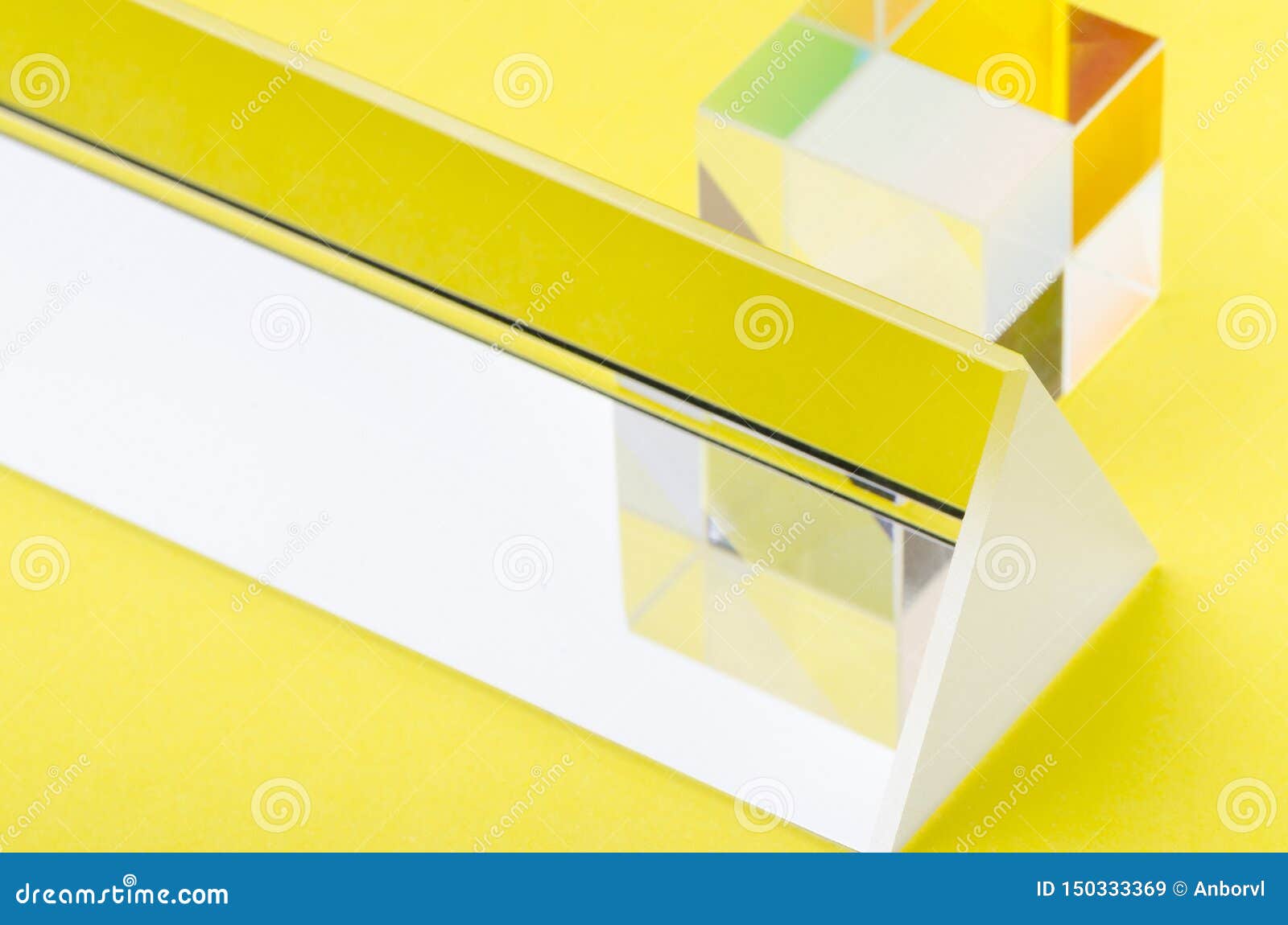Triangular and Square Bright Glass Prism on Yellow Background Stock ...