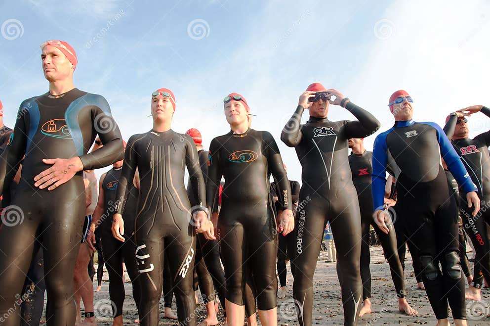 Triathlete Swimmers at Starting Line Editorial Photo - Image of line ...