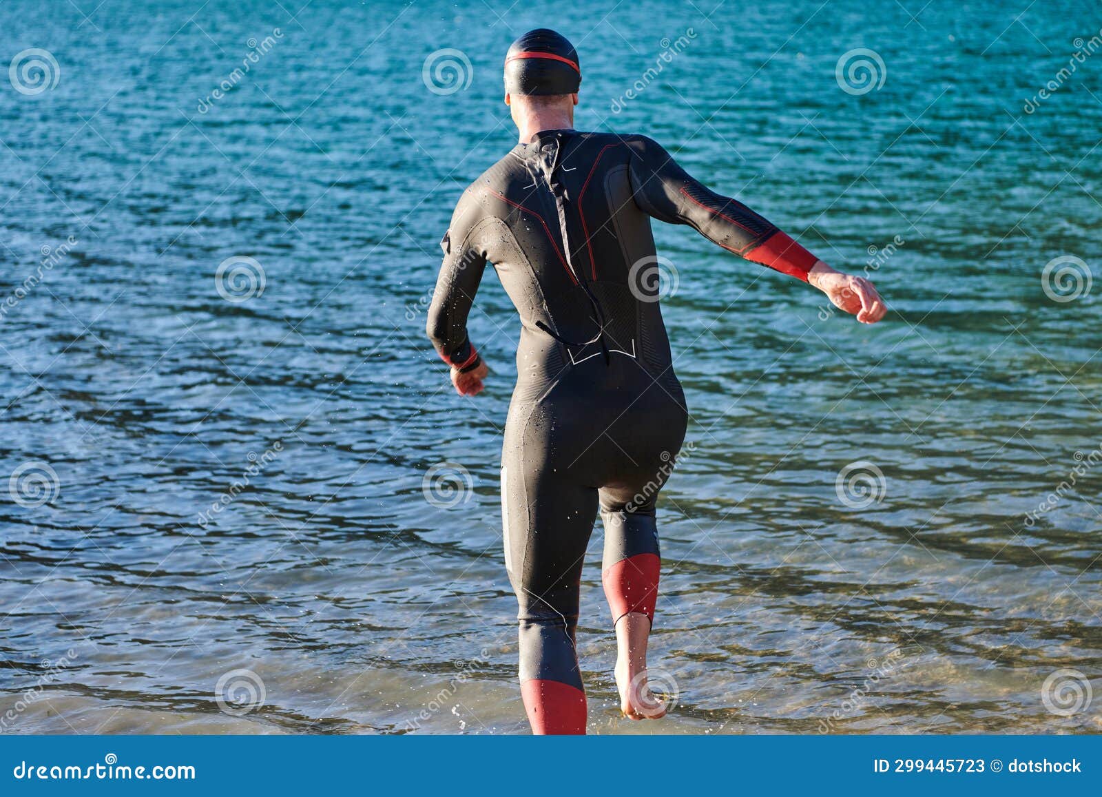 Triathlon Athlete Starting Swimming Training on Lake Stock Image ...