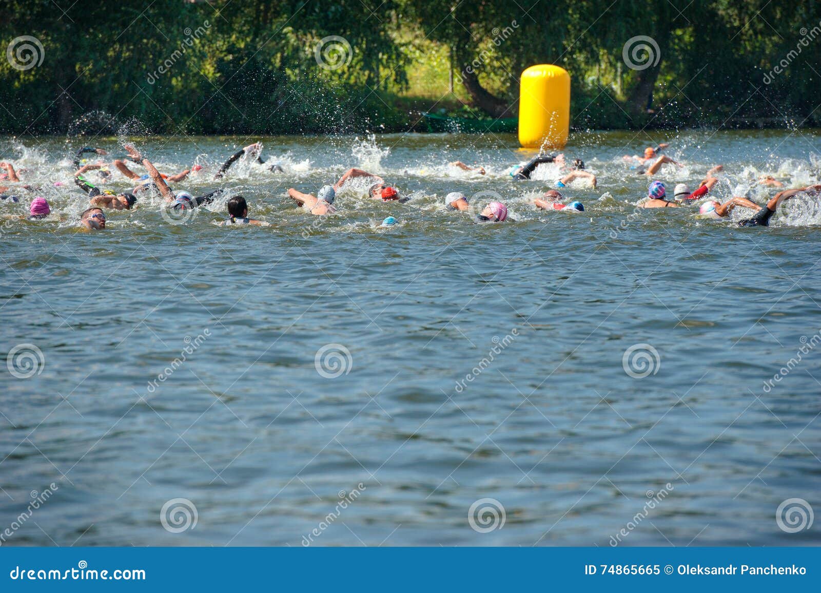 Triathlon Participants in Swim Portion of Race Editorial Image - Image ...