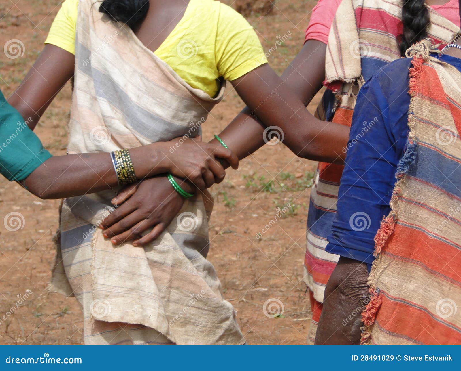Tribal women link arms stock image. Image of women, orissa - 28491029