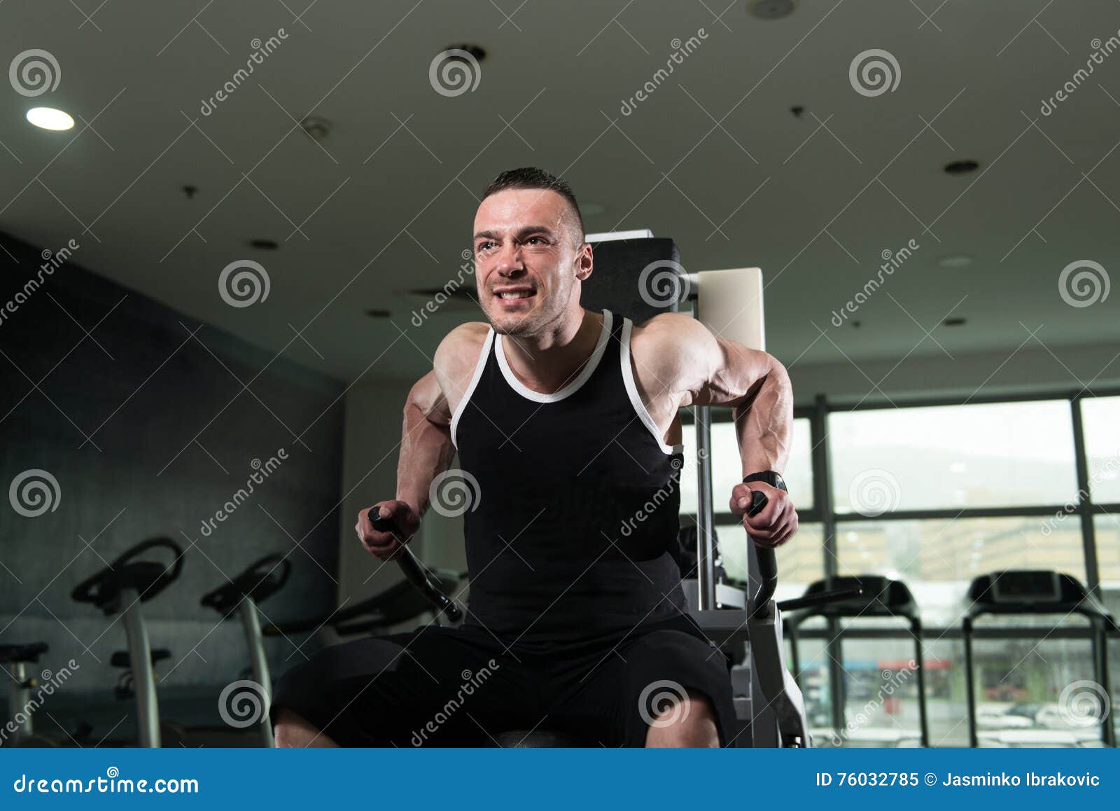 Triceps Exercises on a Machine Stock Image - Image of exercise, power ...