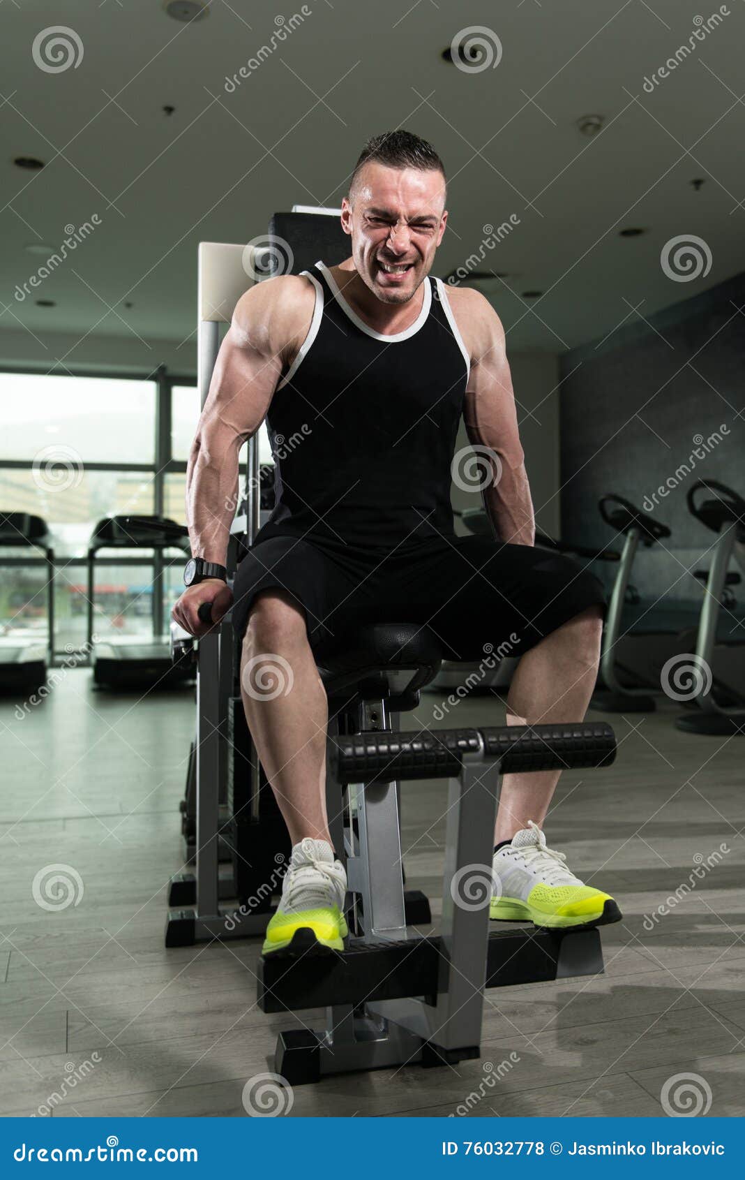 Triceps Exercises on a Machine Stock Photo - Image of machine, indoors ...