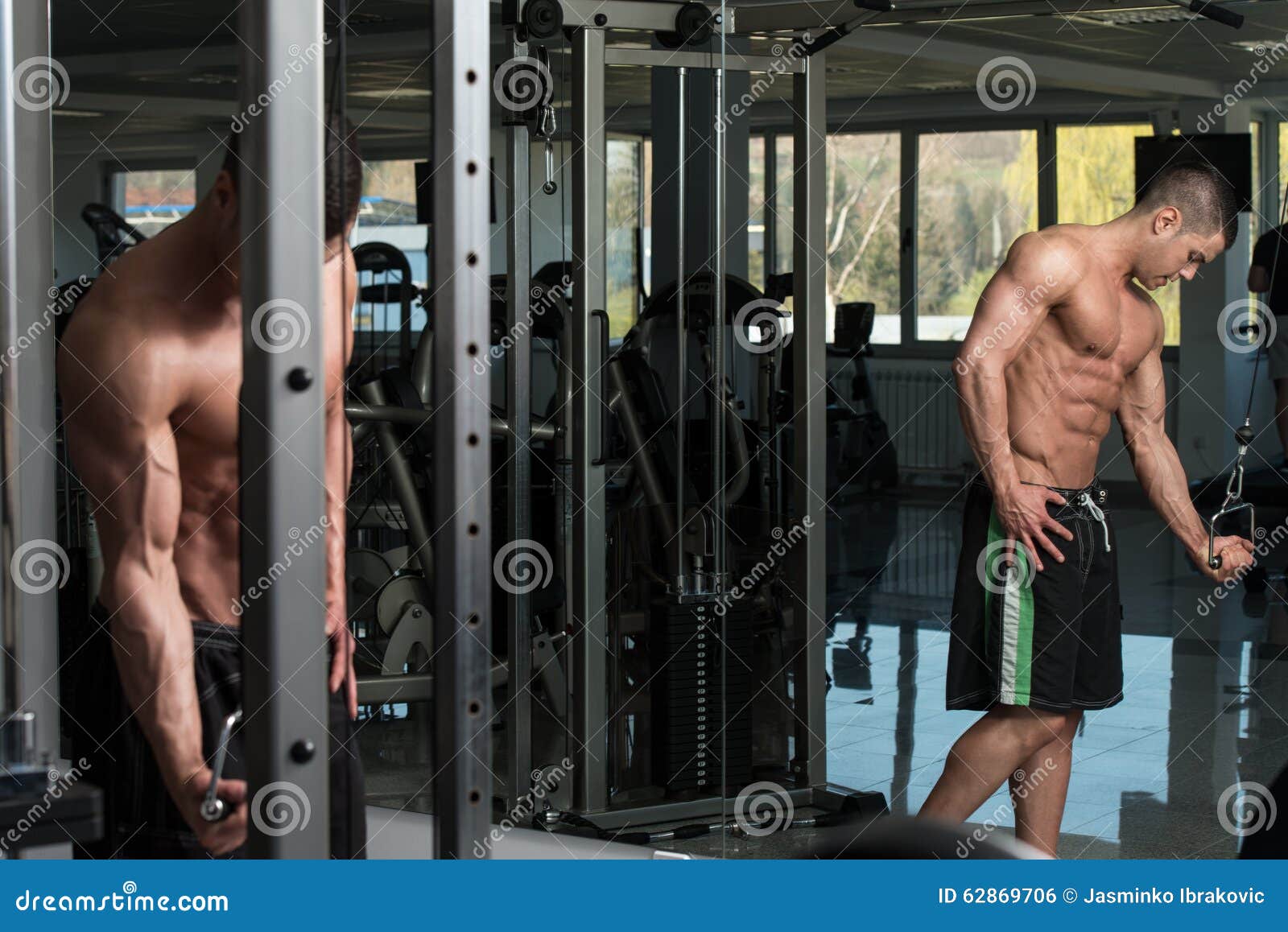 Triceps Exercising with Cable Stock Photo - Image of crossover ...