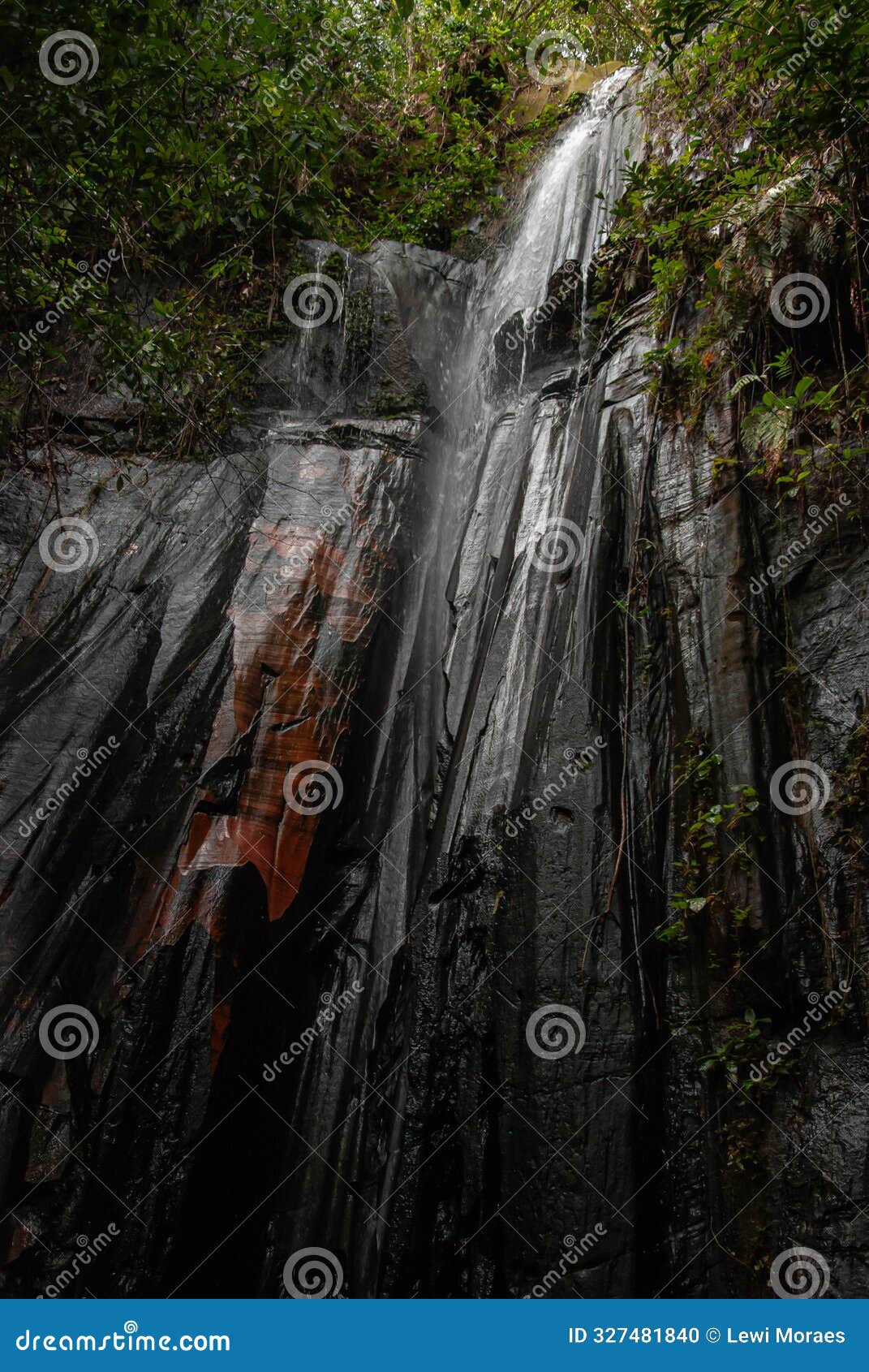 A Trickle of Water Falling into an Iron Ore Pit in the Forest Stock ...