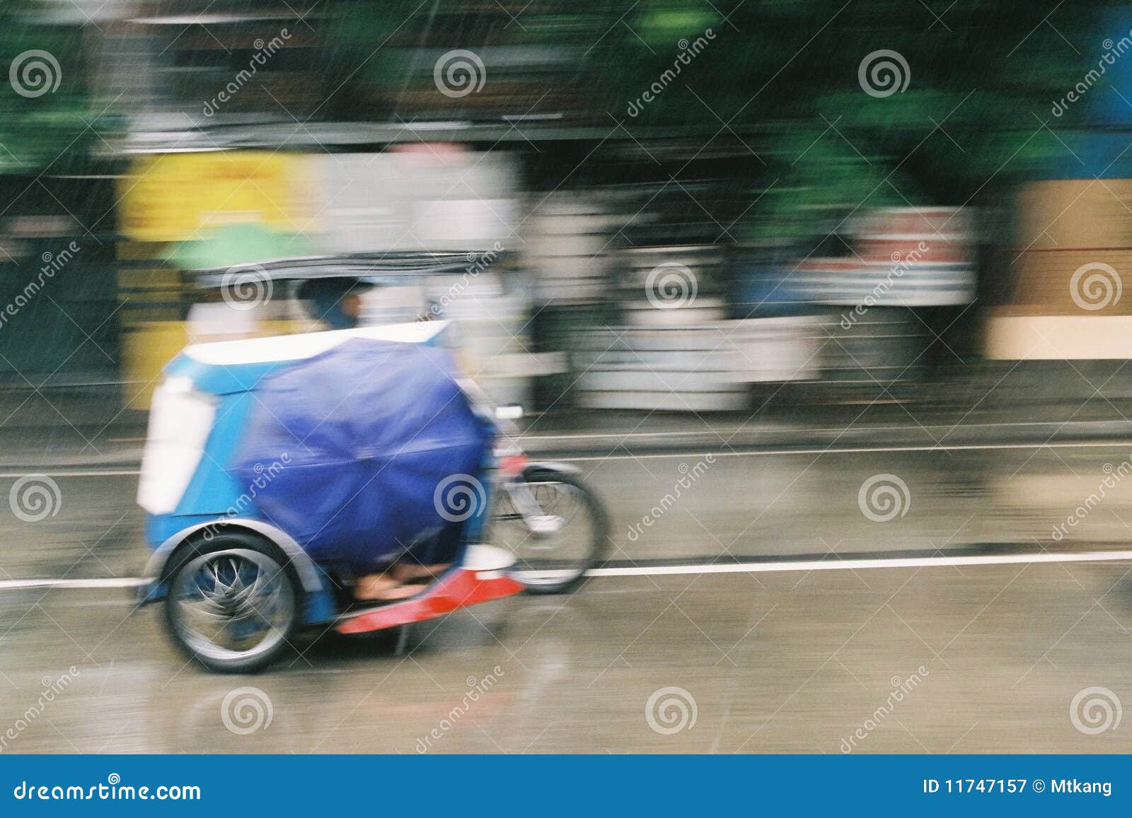Tricycle in Motion, on a Rainy Day Stock Image - Image of wheeled ...