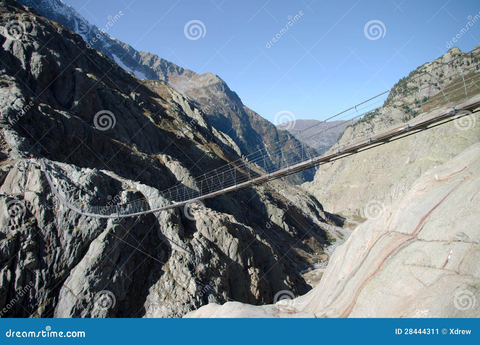 Trift bridge in Alps stock image. Image of mountains - 28444311