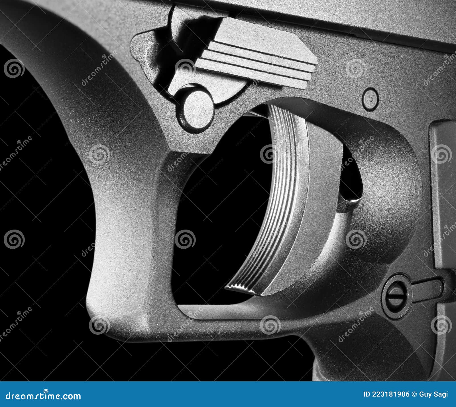 Trigger from a Large Semi-automatic Pistol on a Black Background Stock ...