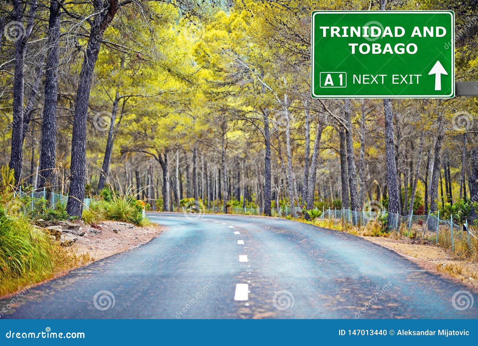 TRINIDAD and TOBAGO Road Sign Against Clear Blue Sky Stock Photo ...