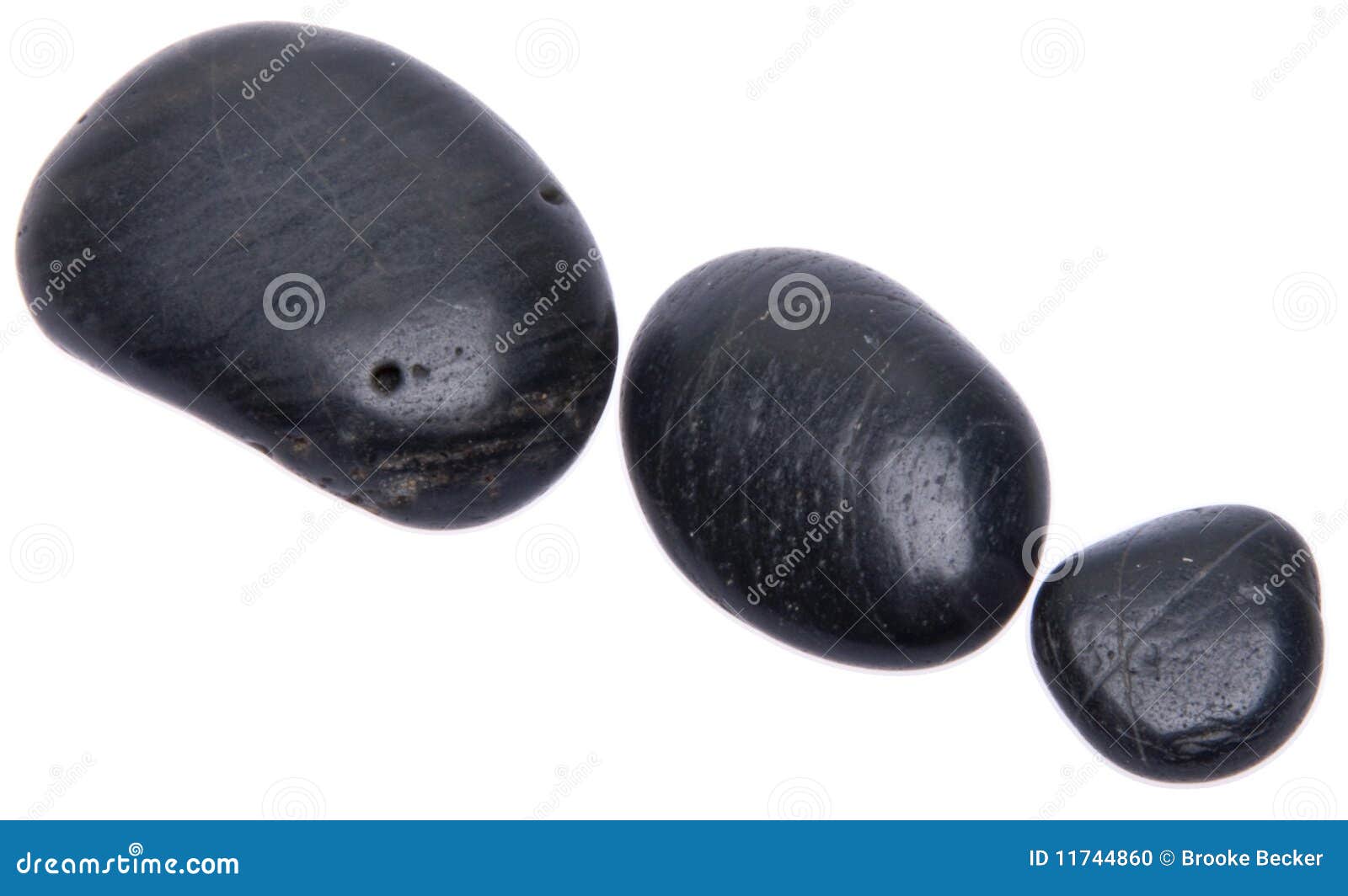 Trio of Black Stones stock photo. Image of serenity, leaf - 11744860