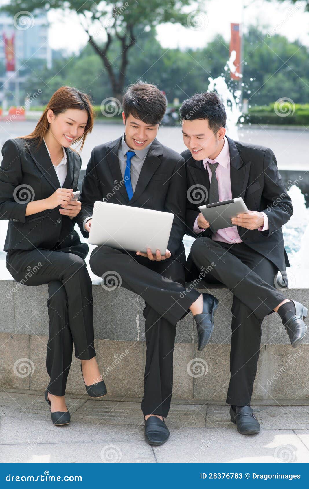 Trio at work stock image. Image of meeting, laptop, sitting - 28376783