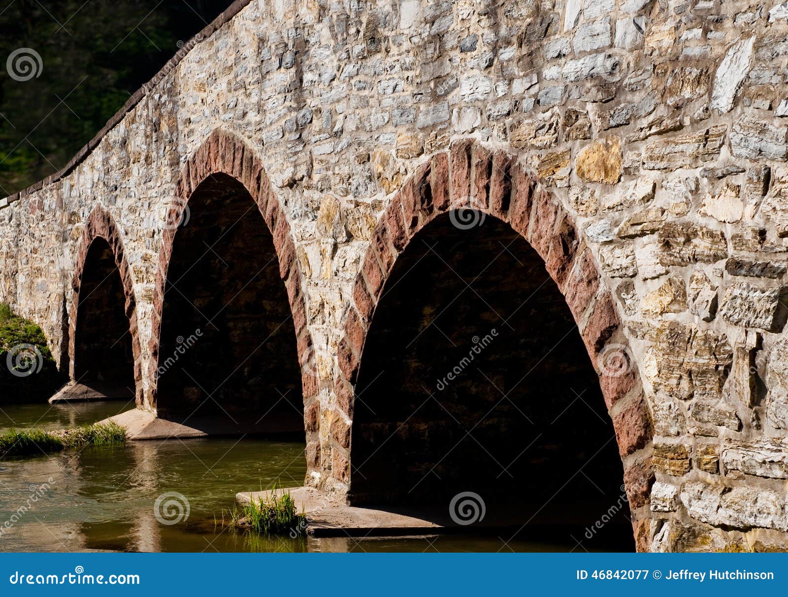 Triple arch stone bridge stock image. Image of arched - 46842077