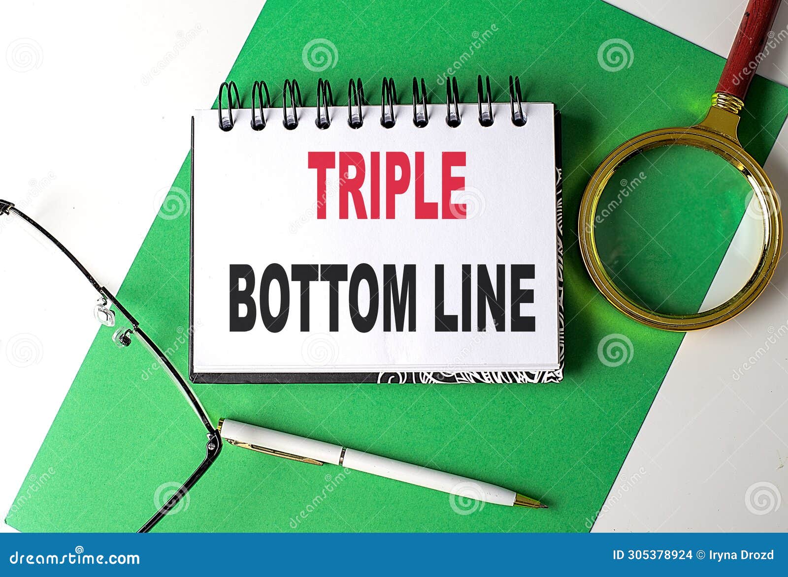 TRIPLE BOTTOM LINE Text on Notebook on Green Paper Stock Photo - Image ...