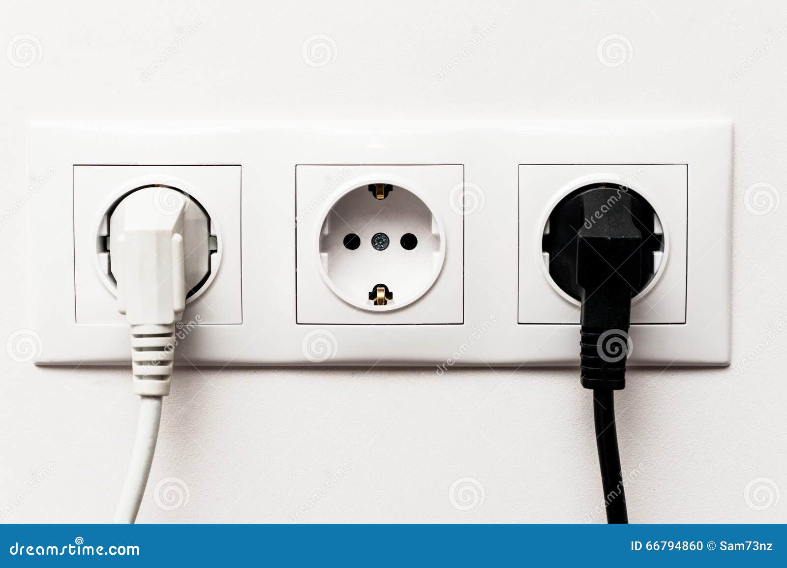 Triple Electrical Socket with Two Plugged Cables Stock Photo - Image of ...