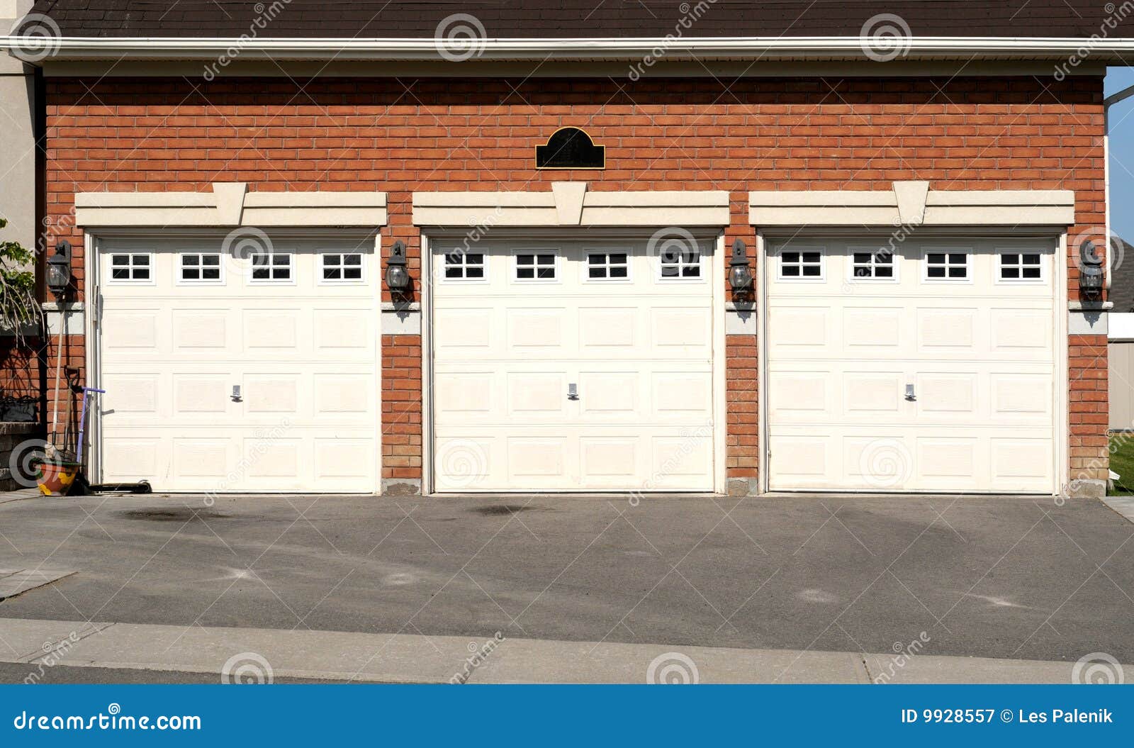 Triple Garage with Flower Pot Stock Image - Image of building, three ...