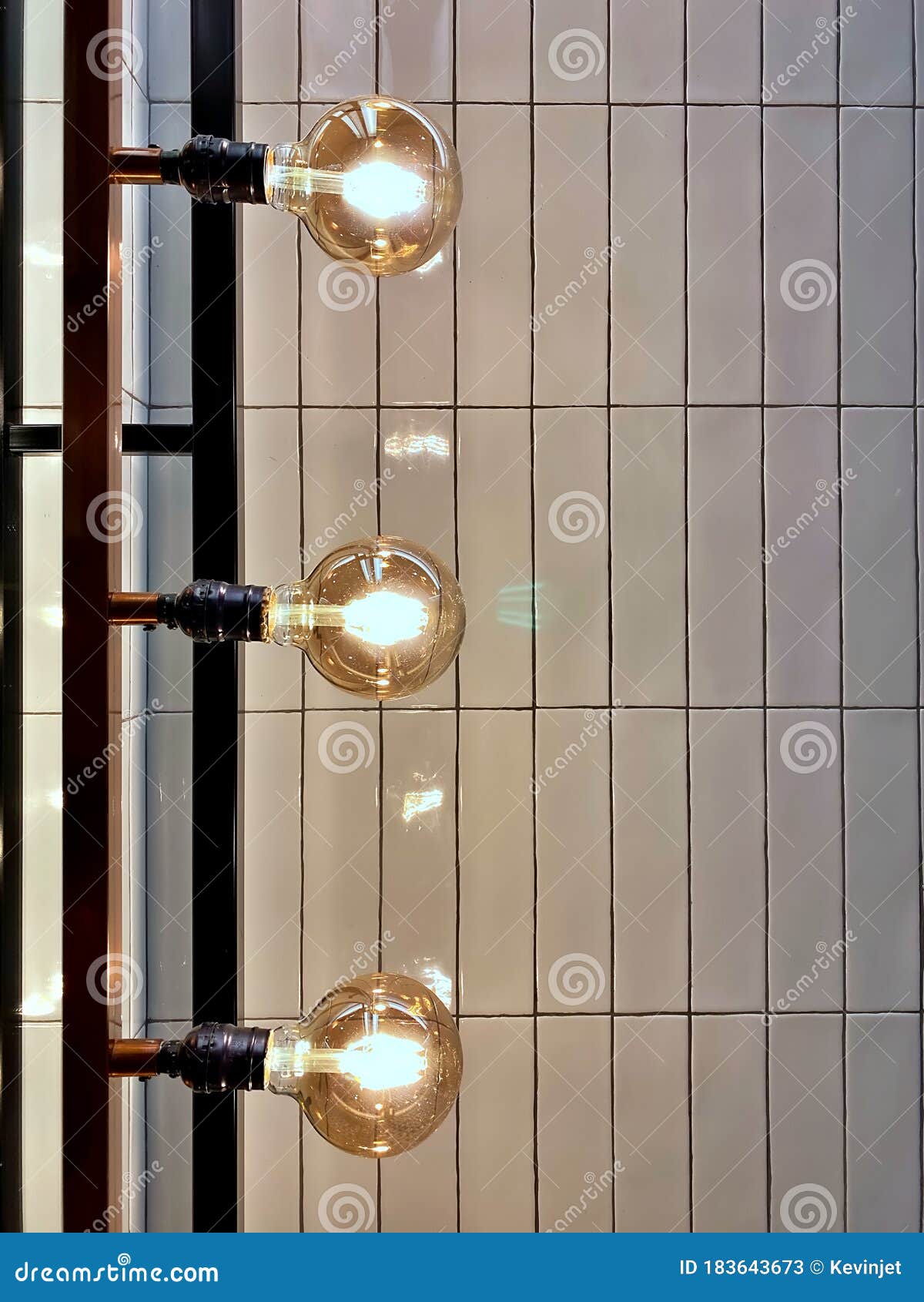 Triple Light Bulb in the Steel Row Stock Image - Image of bulb, indoor ...