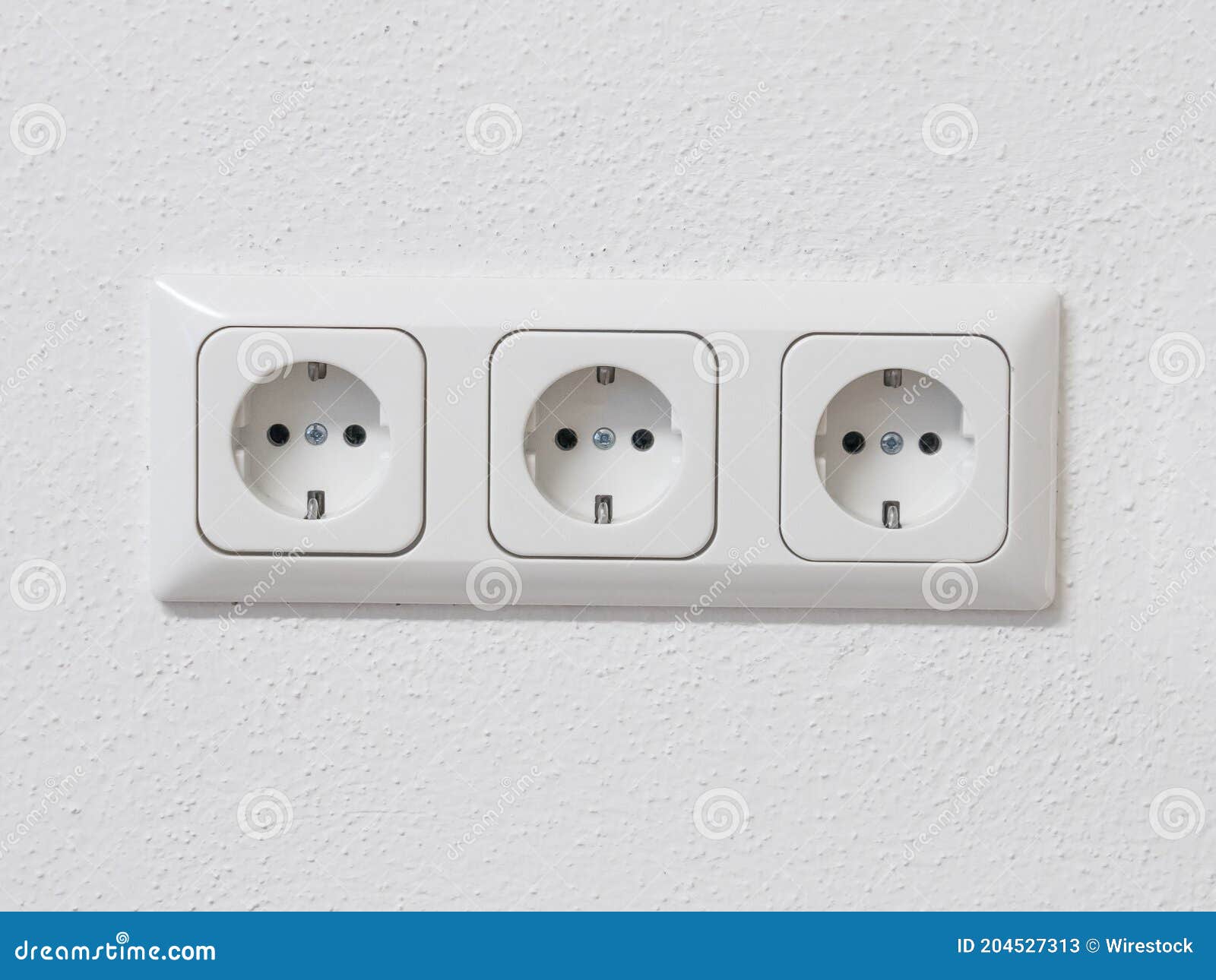 White Electrical Wall Socket in a Textured White Wall Stock Image ...