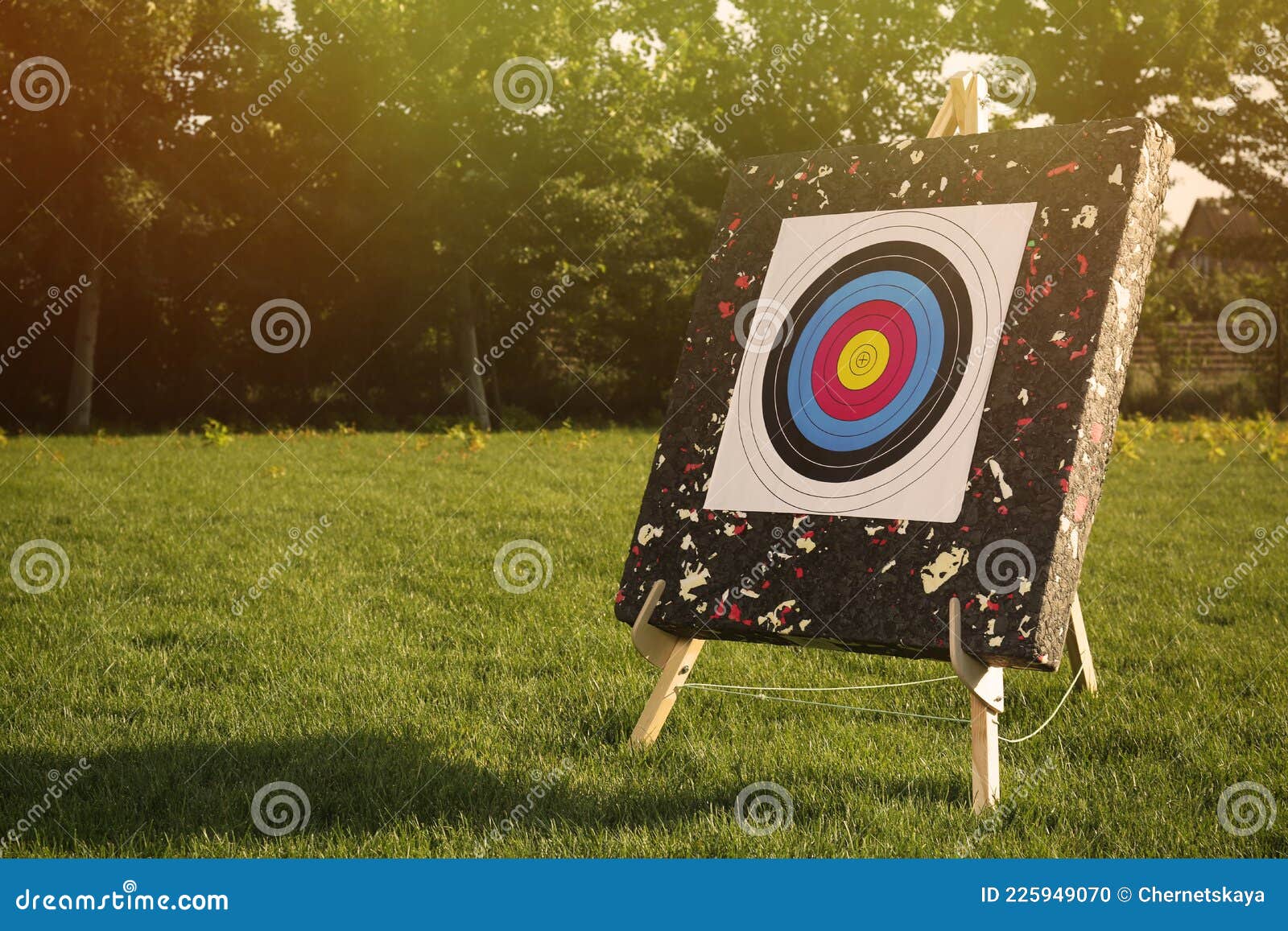 Tripod with Archery Target on Grass in Park. Space for Text Stock Photo ...