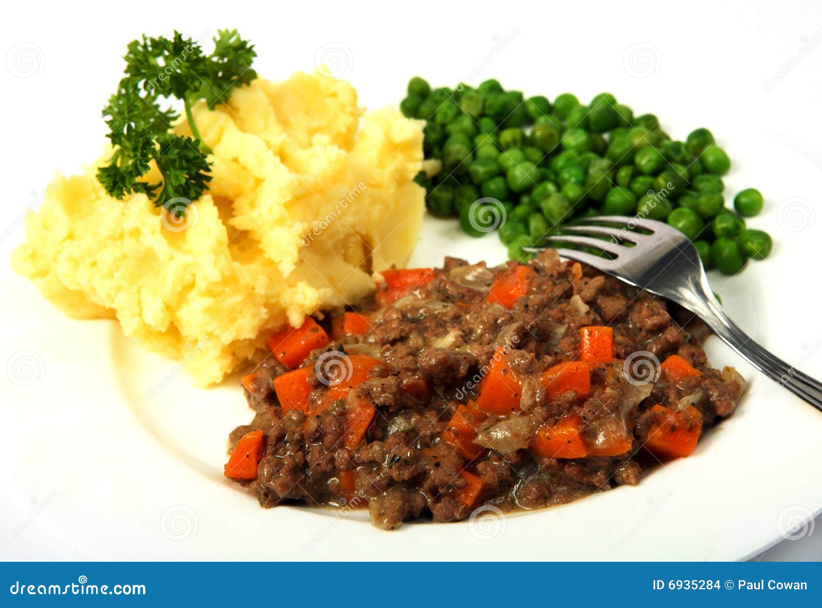 Triti Le Patate Ed I Piselli Fotografia Stock - Immagine di tritato ...