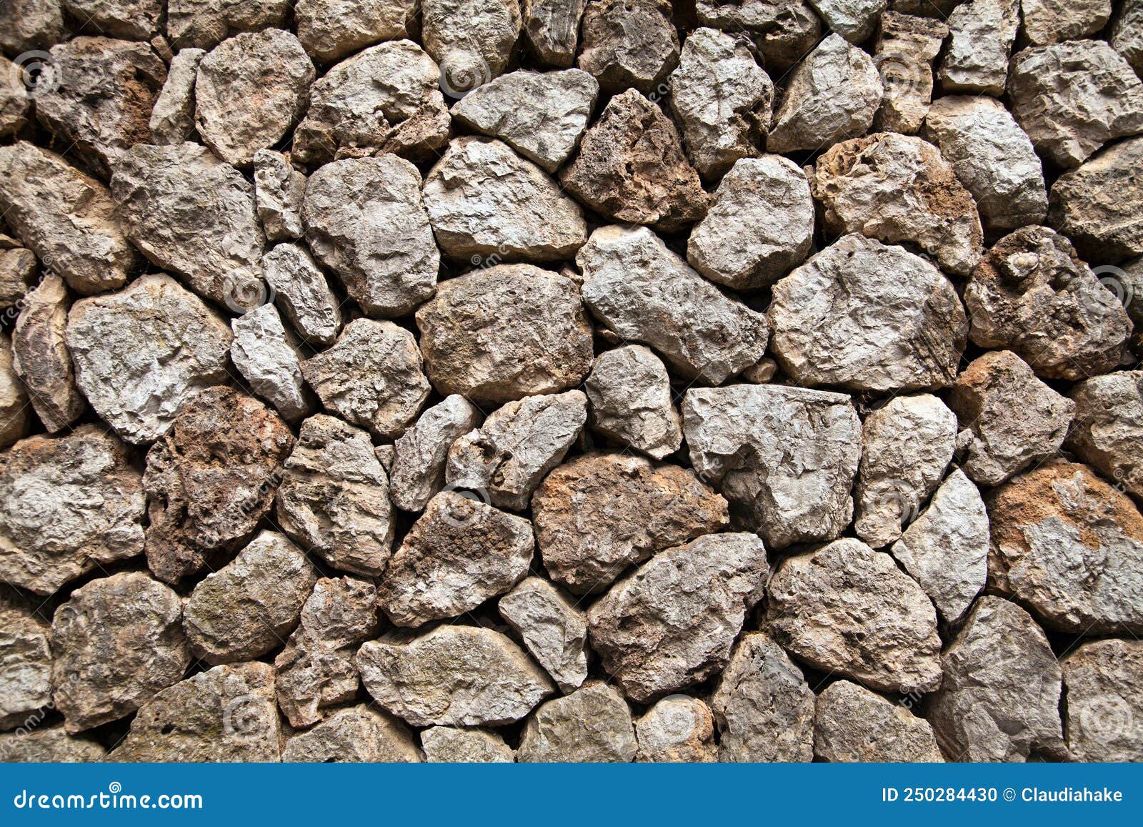 Dry stone wall stock photo. Image of layered, limestone - 250284430