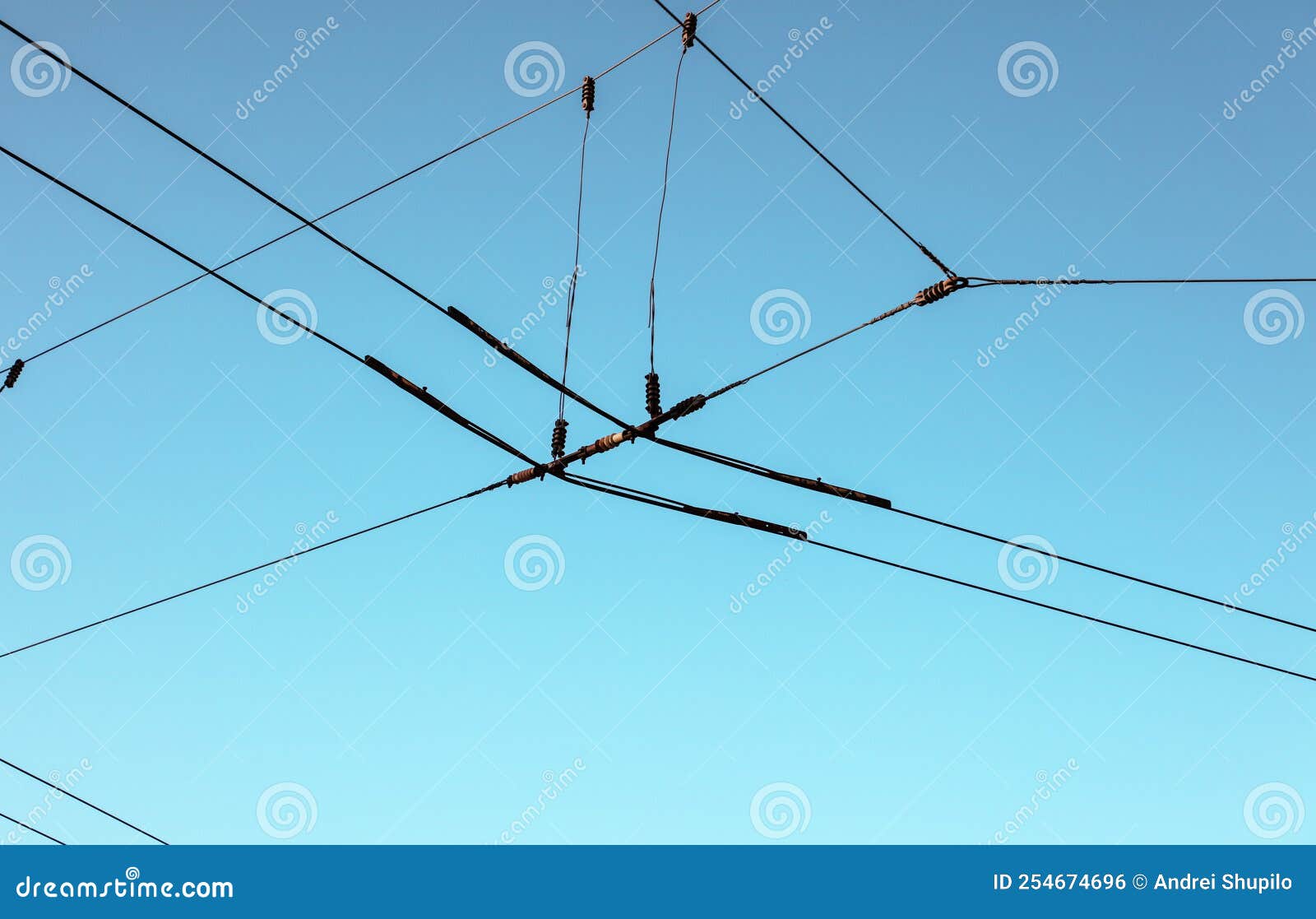 Trolley Bus Wires Against the Blue Sky Stock Photo - Image of ...