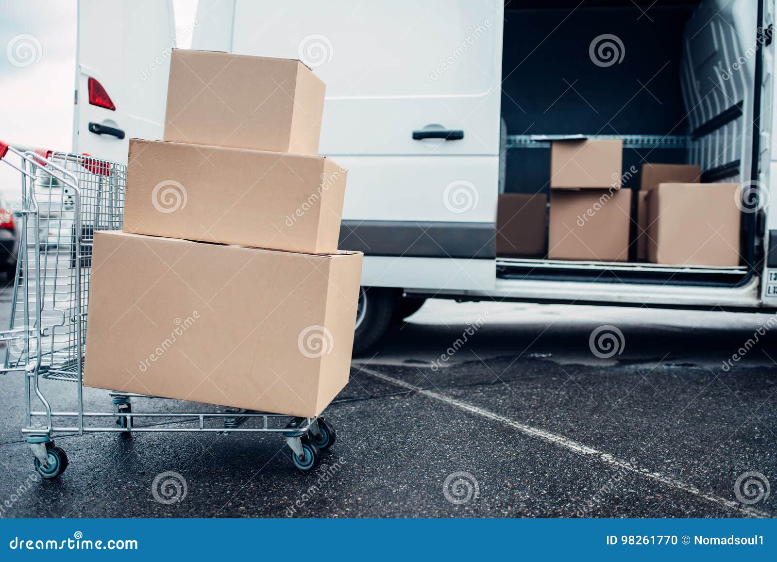 Trolley with Cardboard Boxes Against Mail Van Stock Photo - Image of ...