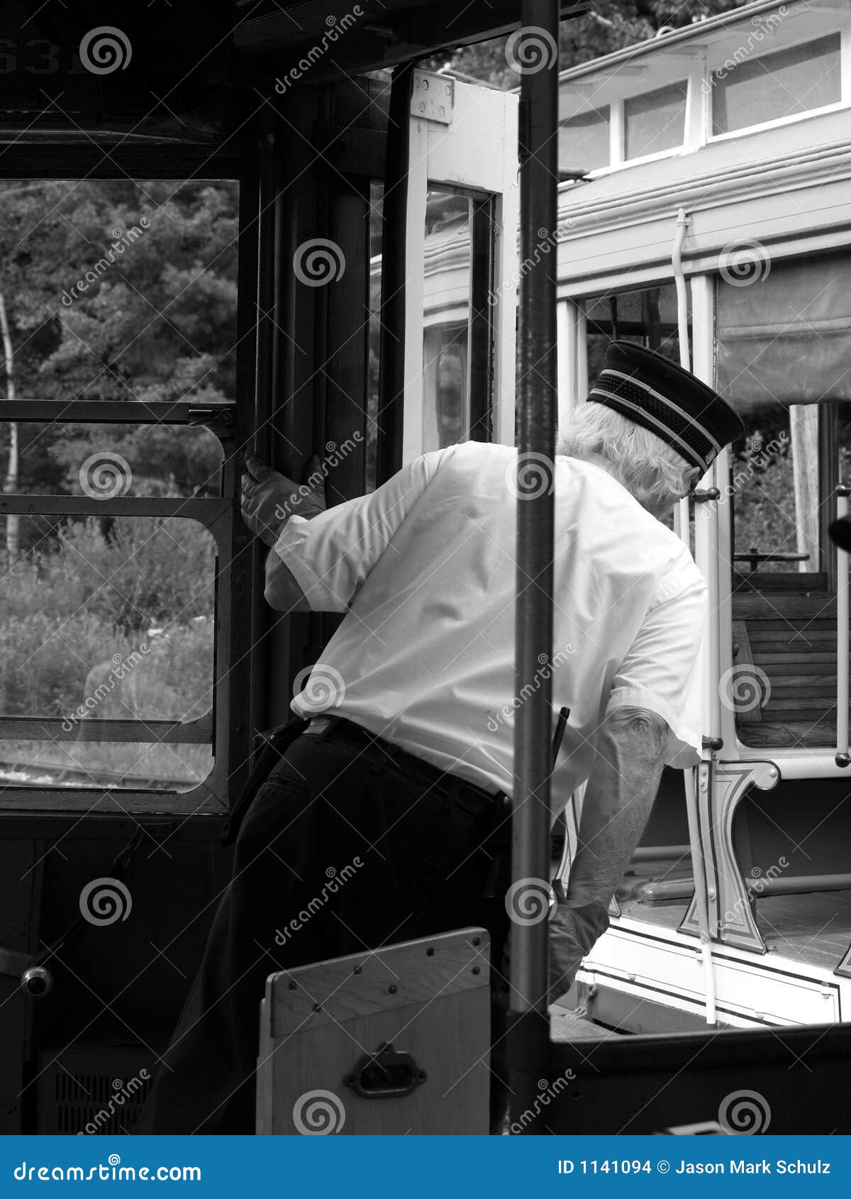 Trolley Conductor Leaning Out Stock Photo - Image of white, tenure: 1141094
