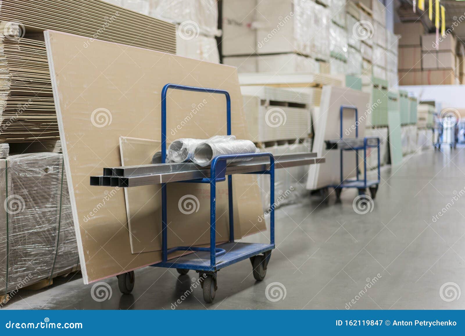 Trolley In A Hardware Store With Building Materials. Warehouse Large ...