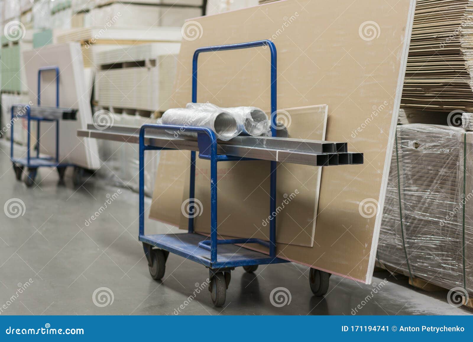 Trolley In A Hardware Store With Building Materials. Warehouse Large ...