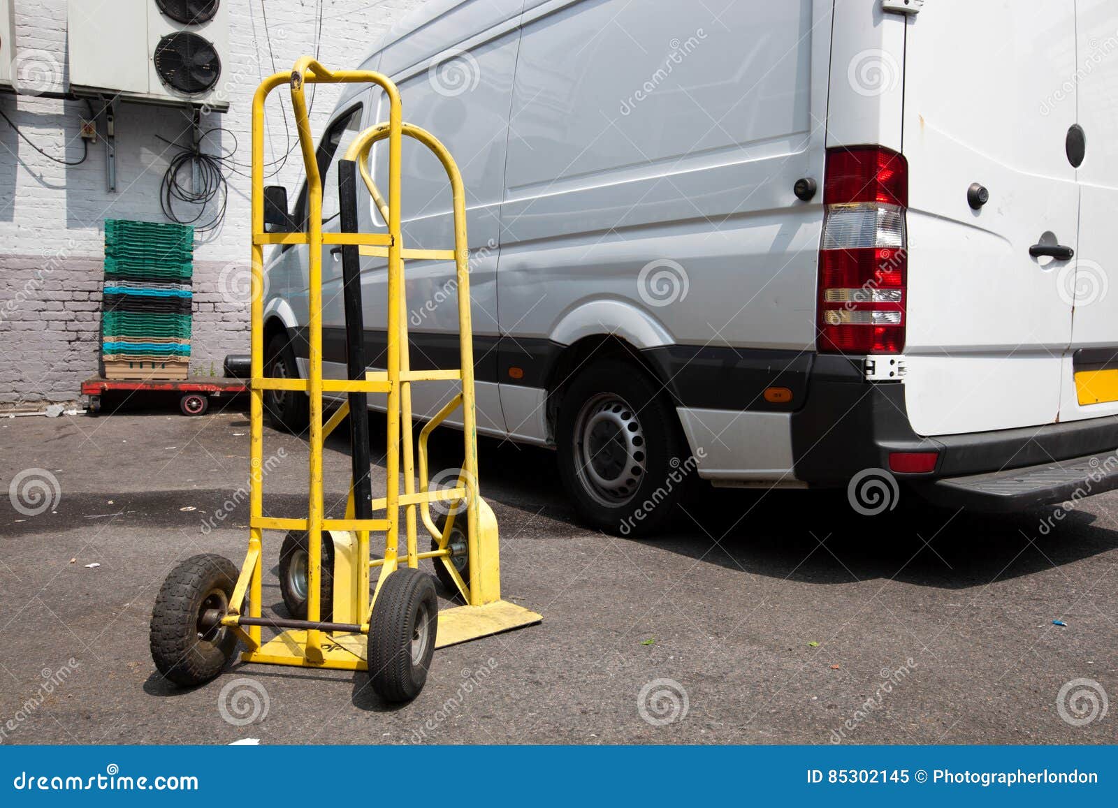 Trolley and Van Outside Warehouse Editorial Image - Image of metal ...