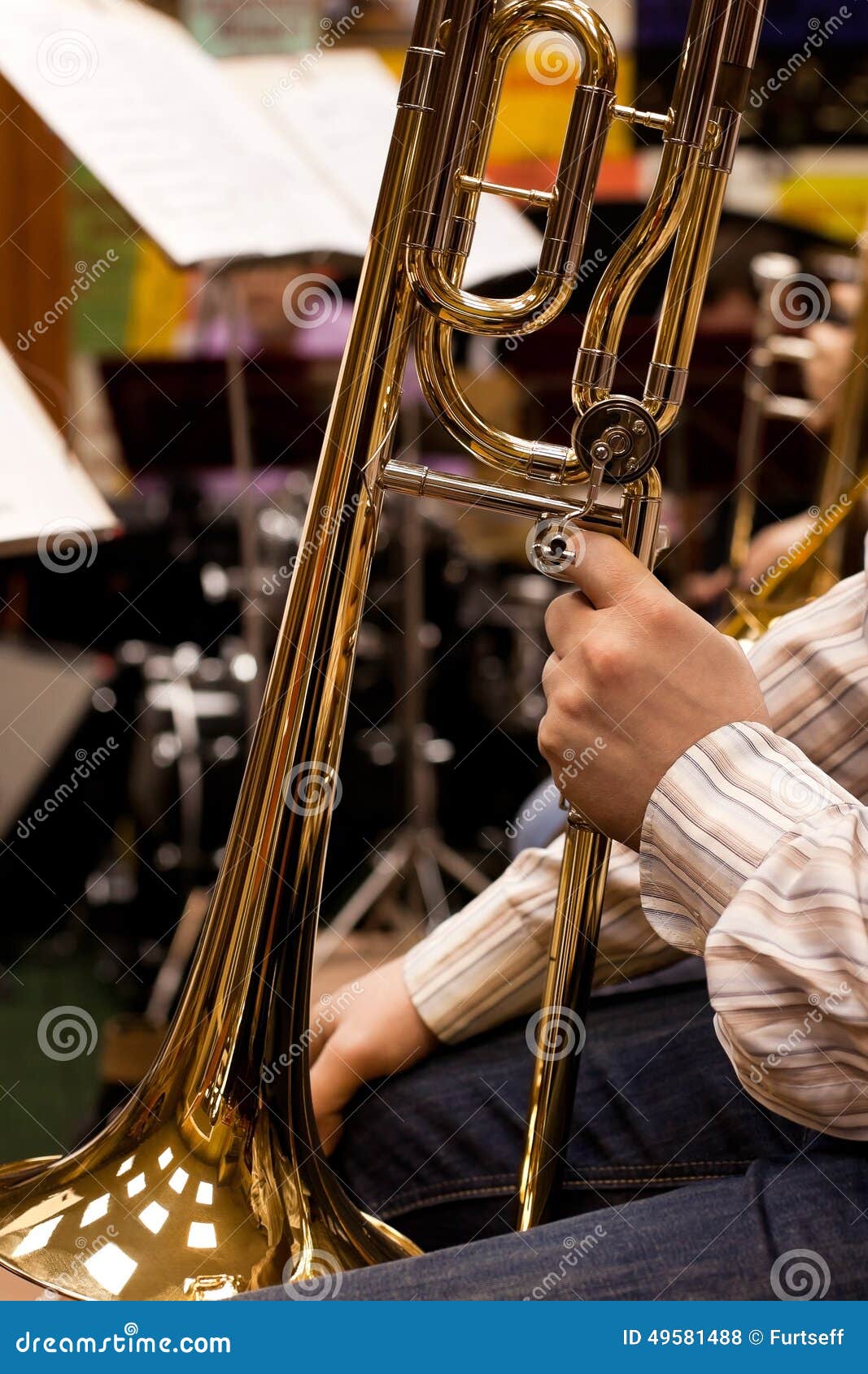 Trombone in the Hands of a Musician Stock Photo - Image of music, brass ...