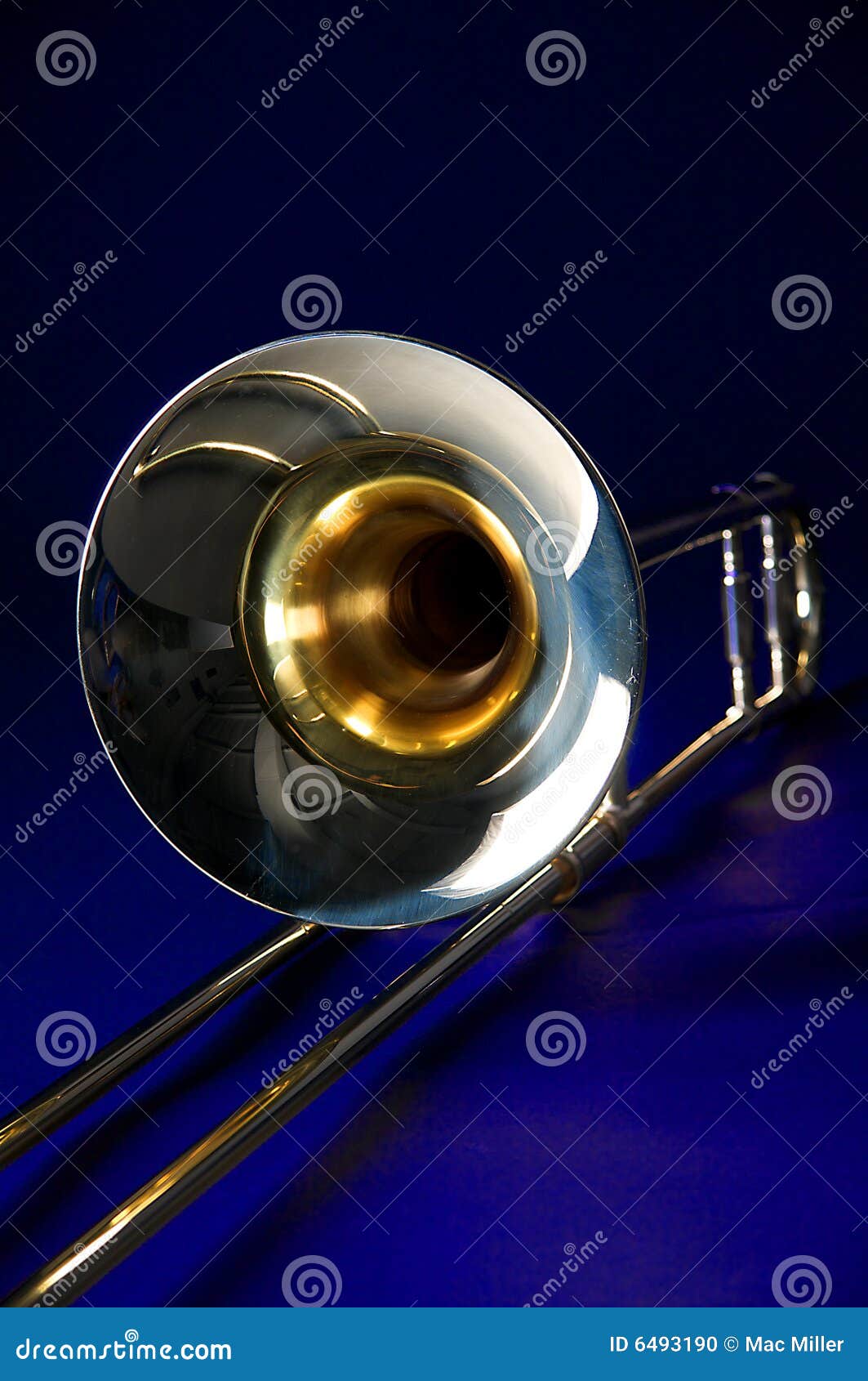 Trombone Isolated Blue Bk stock photo. Image of trombone - 6493190