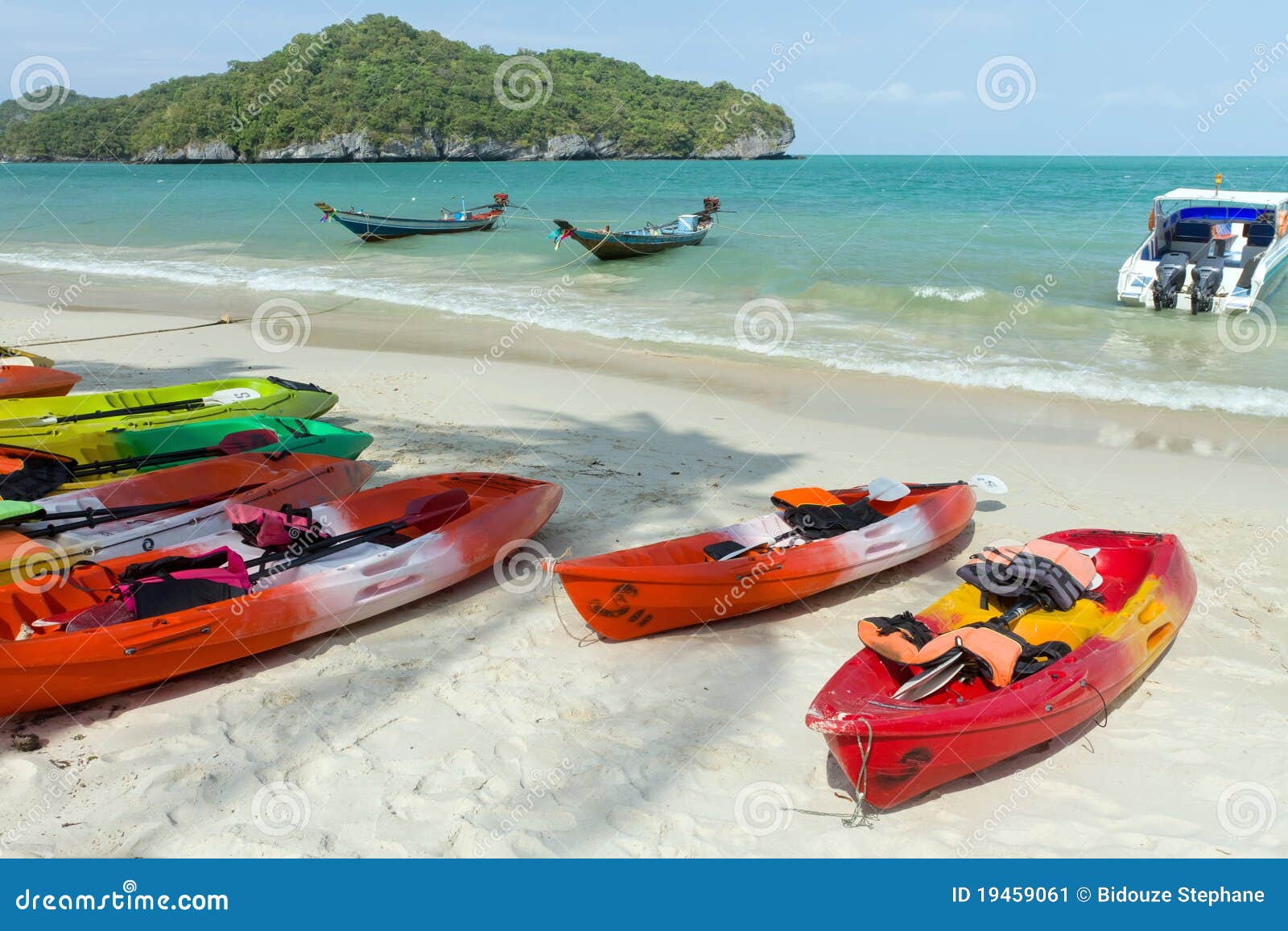 Tropical beach and canoe stock image. Image of speedboat - 19459061