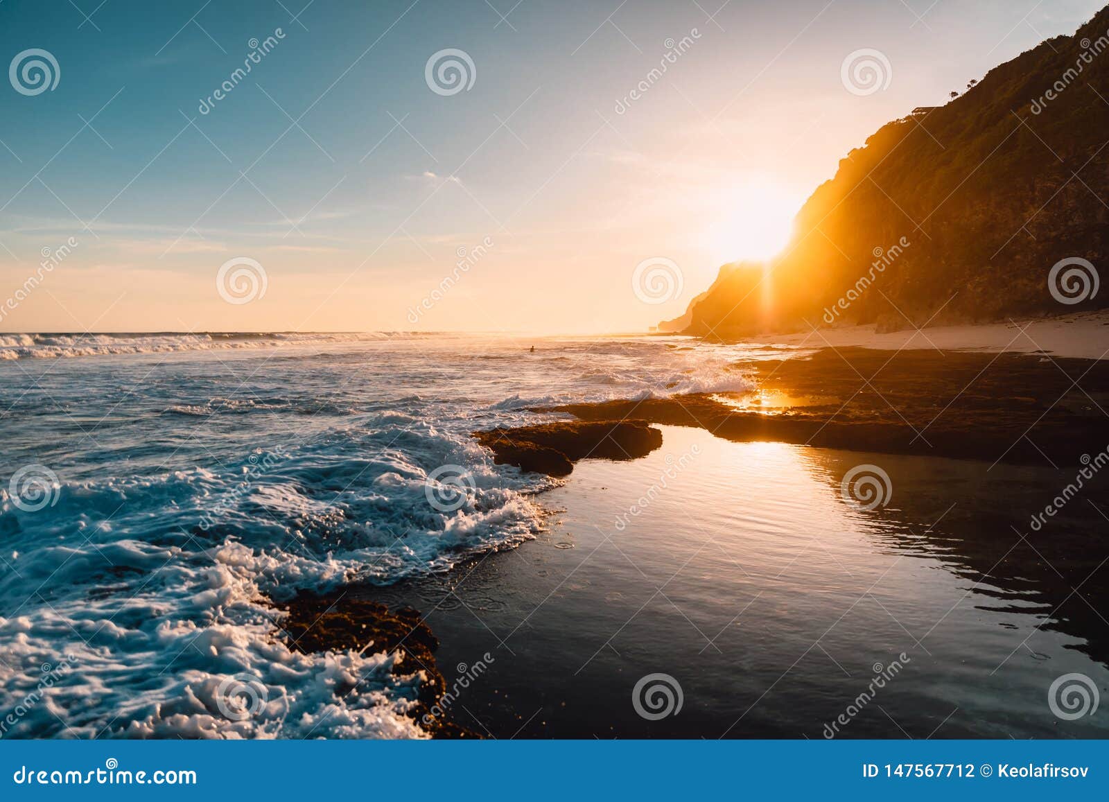 Tropical Beach with Ocean, Waves and Sunshine at Sunset Stock Photo ...