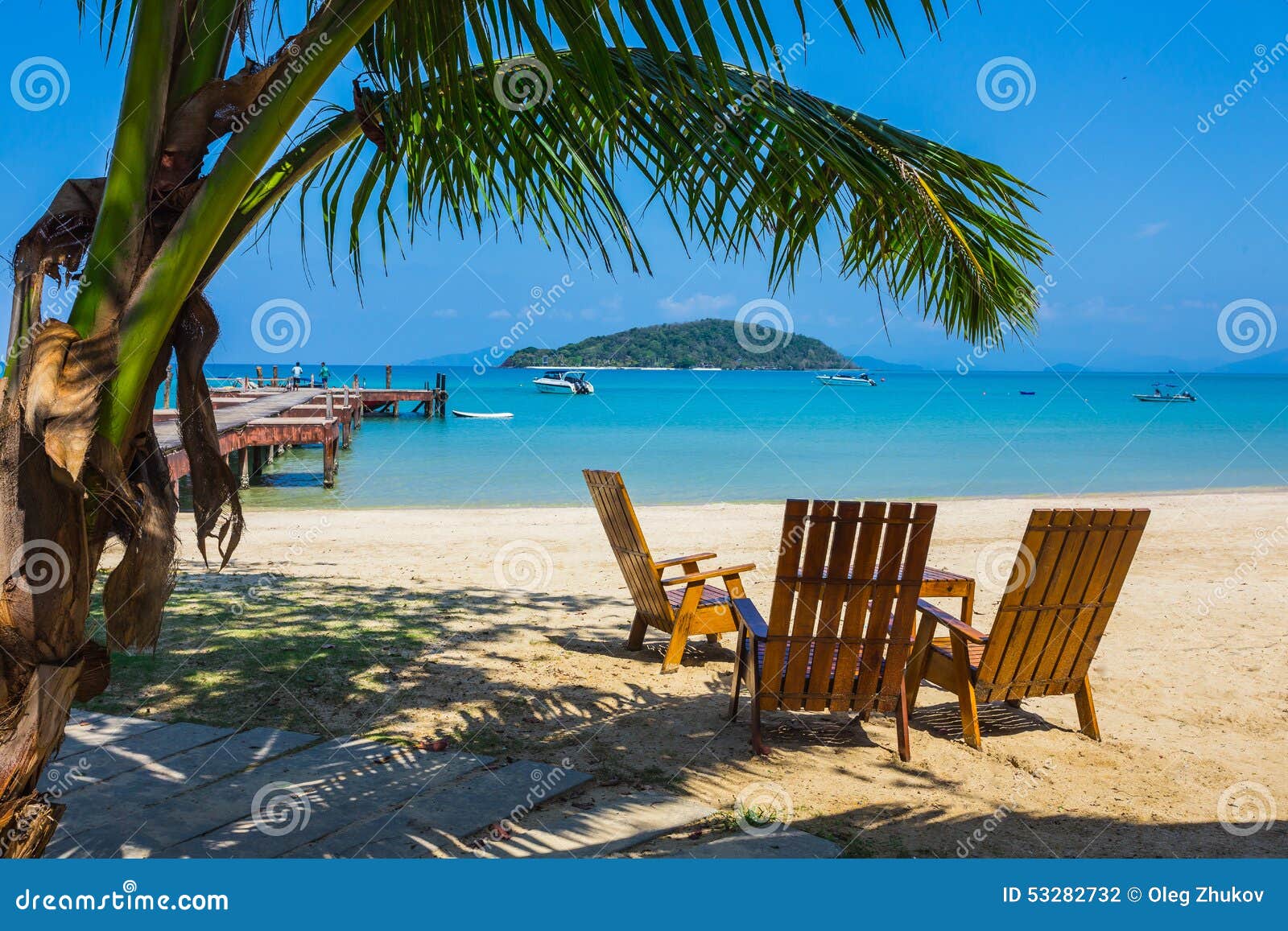 Tropical Beach Panorama with Deckchairs, Boats and Palm Tree Stock ...
