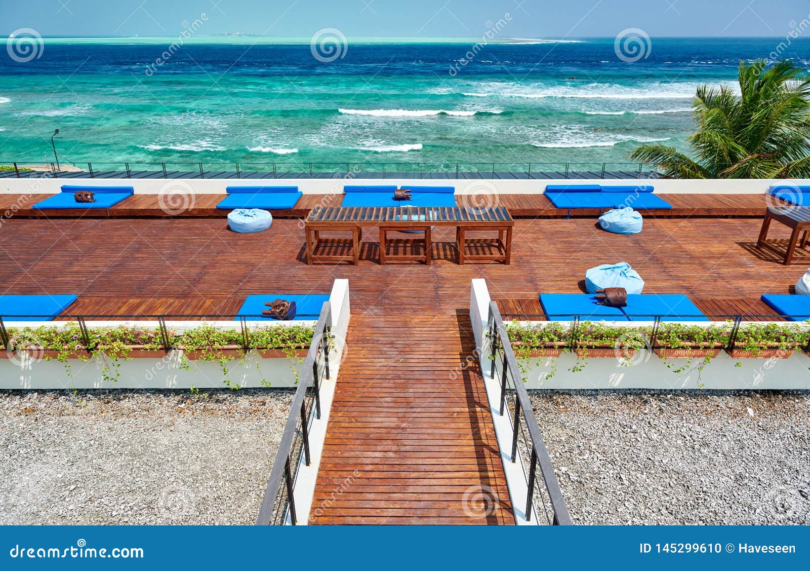 Tropical Beach with Patio Deck Stock Photo - Image of beach, seascape ...