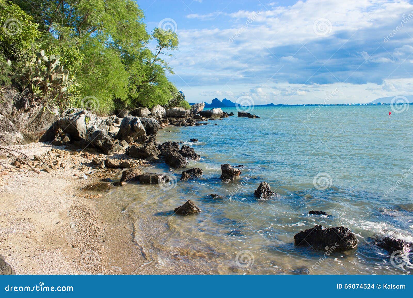 Tropical beach and rock stock photo. Image of wave, seychelles - 69074524