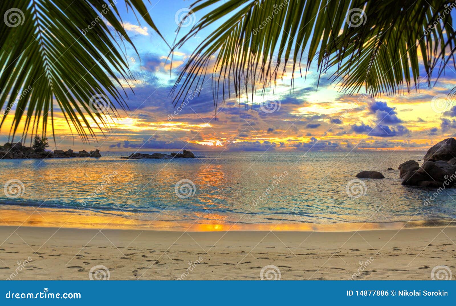 Tropical beach at sunset stock photo. Image of praslin - 14877886