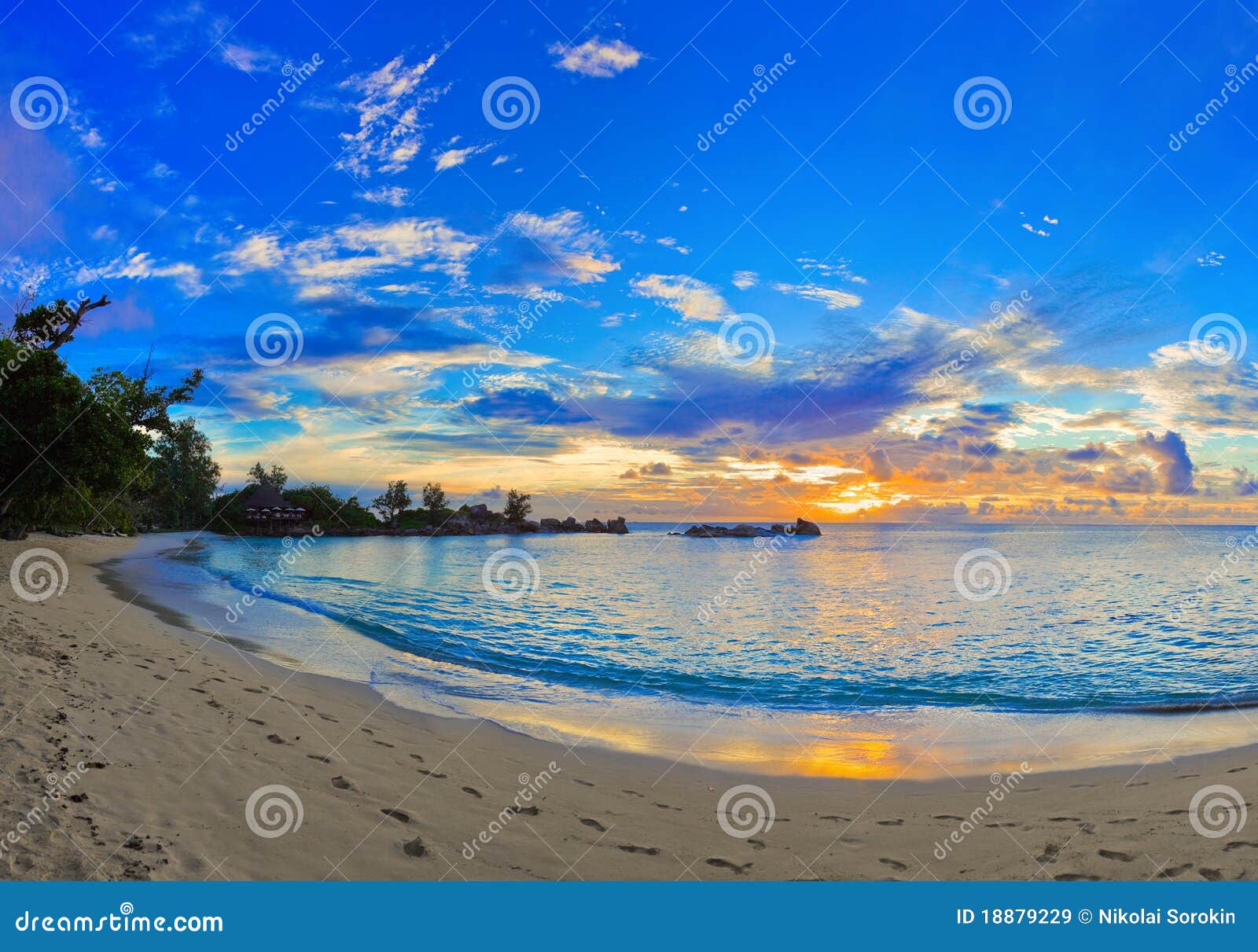 Tropical beach at sunset stock image. Image of ocean - 18879229
