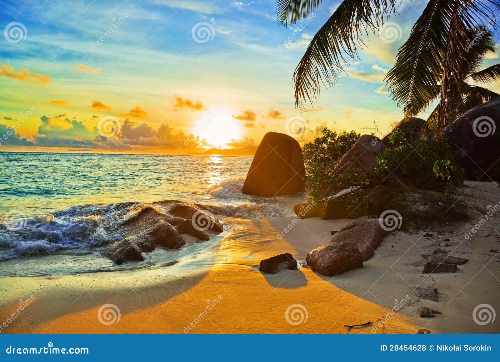 Tropical beach at sunset stock photo. Image of seychelles - 20454628