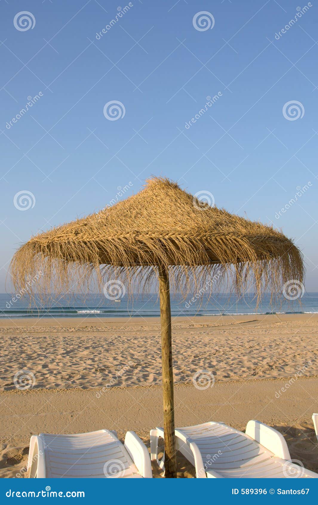 Tropical beach umbrella stock photo. Image of paradise - 589396