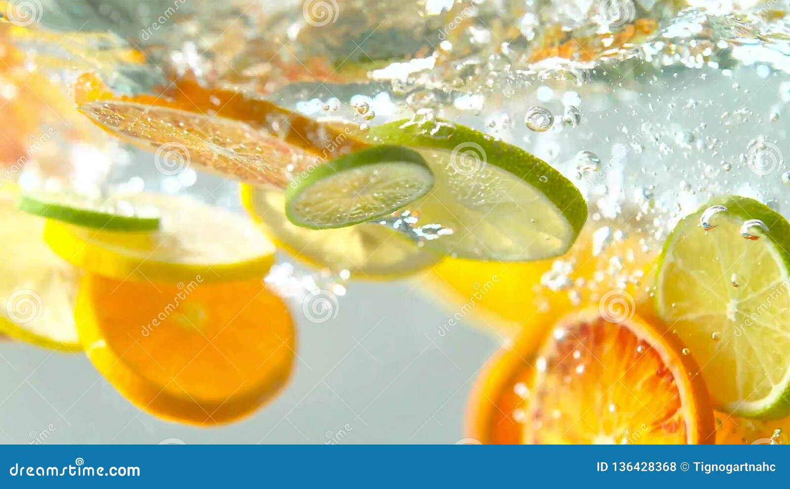 Tropical Citurs Fruits Slice Falling In Water Stock Photo - Image of ...