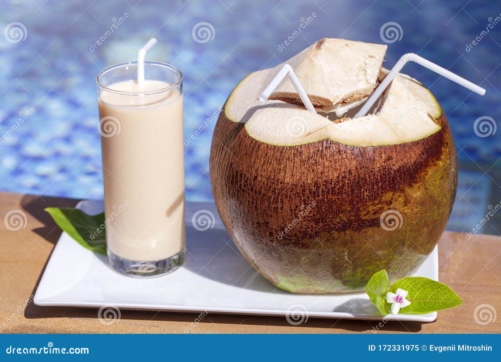 Tropical Coconut Cocktail by the Pool Stock Image - Image of healthy ...
