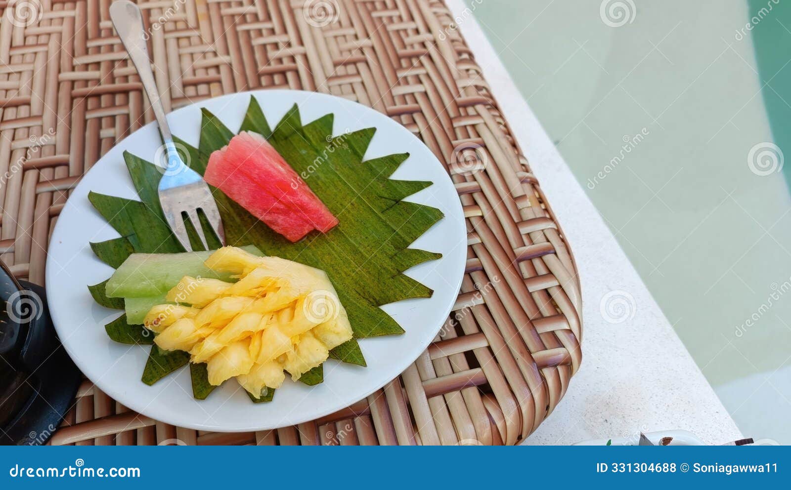 Tropical Fruit Plate on Elegant Woven Tray by Pool Stock Photo - Image ...