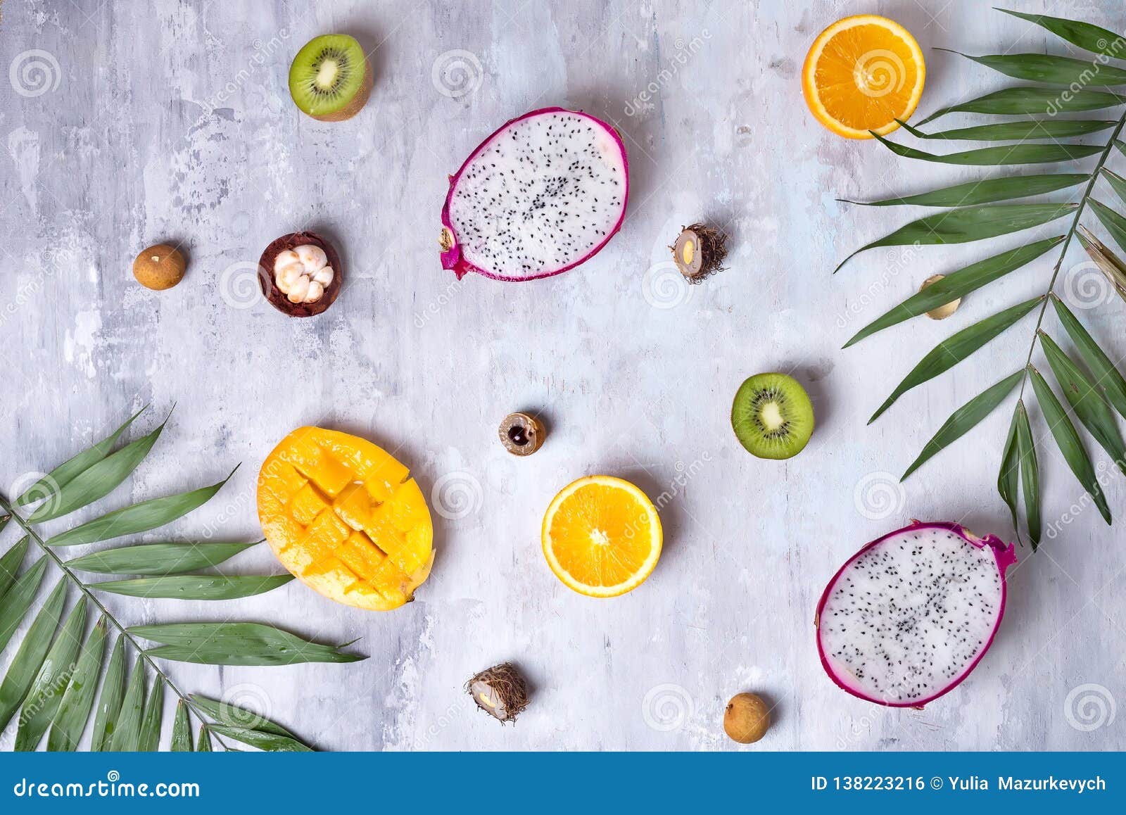 Tropical Fruits Assortment on a Stone Light Background Pattern. Top ...