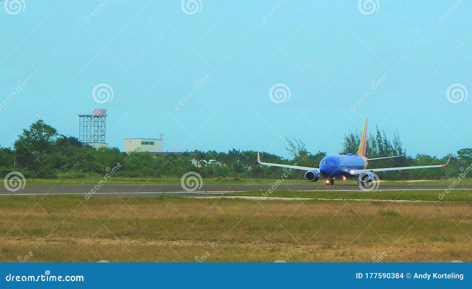 Tropical Holiday Plane Landing on the Runway Editorial Stock Image ...