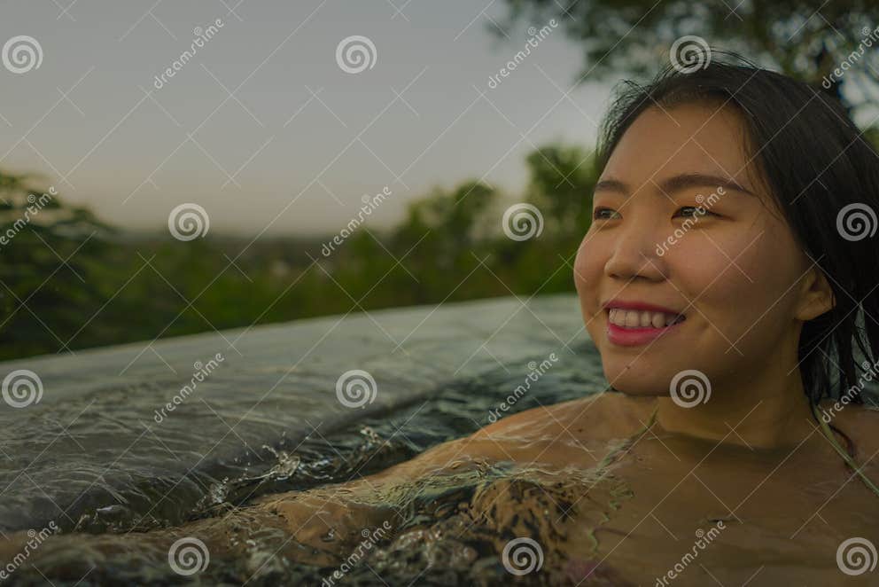 Tropical Holidays Lifestyle Portrait Of Young Beautiful And Happy Asian