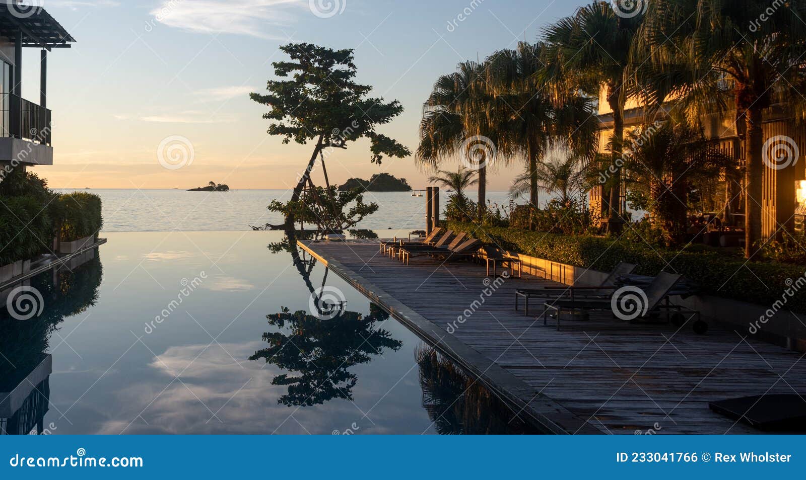 Reflections in Infinity Pool at a Resort at Twilight Stock Photo ...