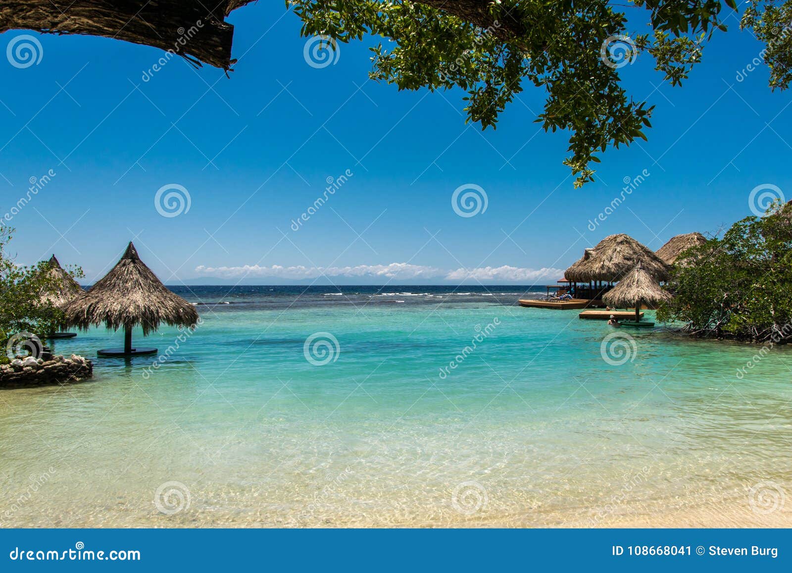 Tropical Oasis stock image. Image of island, bungalow - 108668041